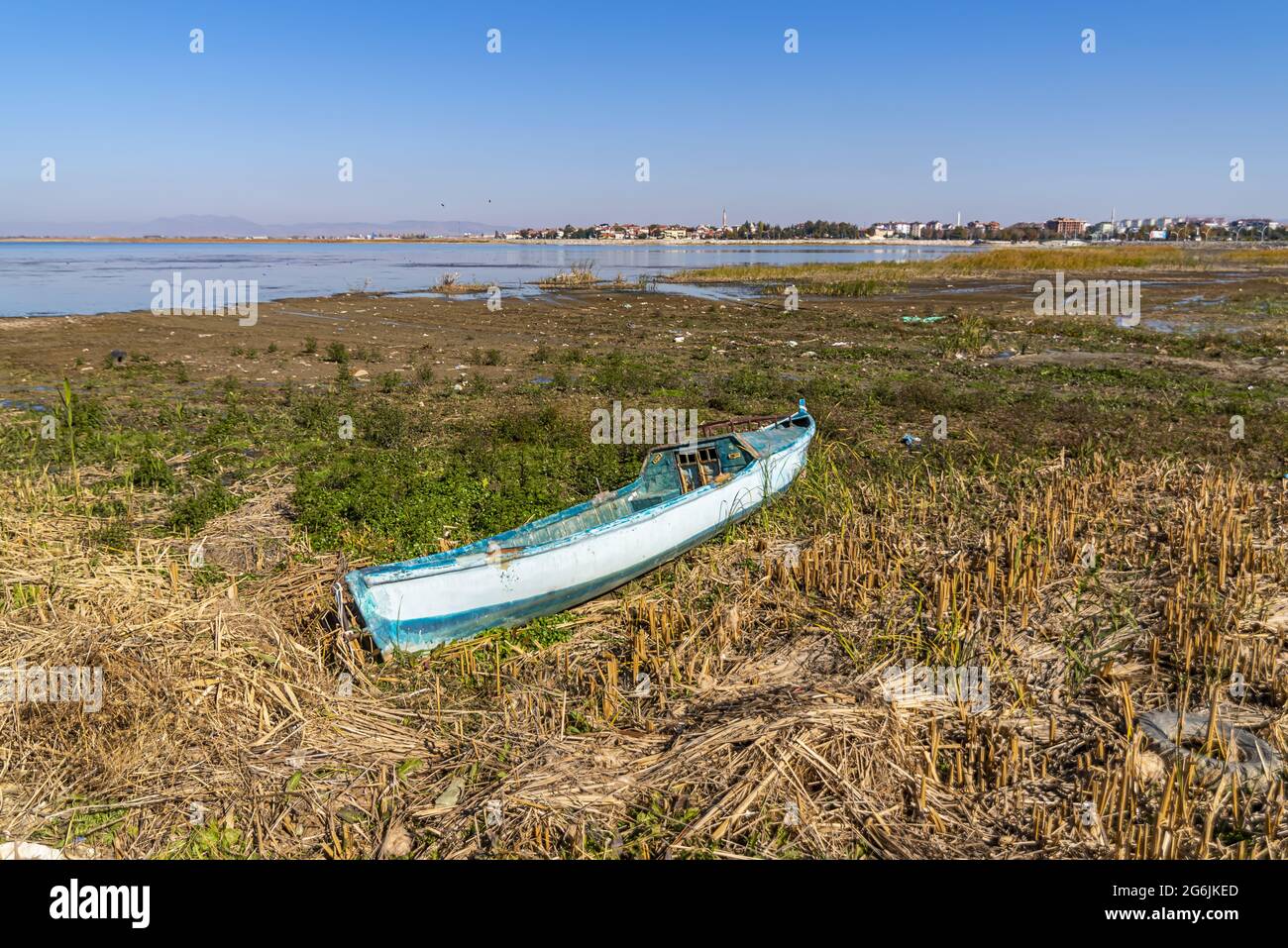 Shot of a broken fisher boat near lake Stock Photo - Alamy