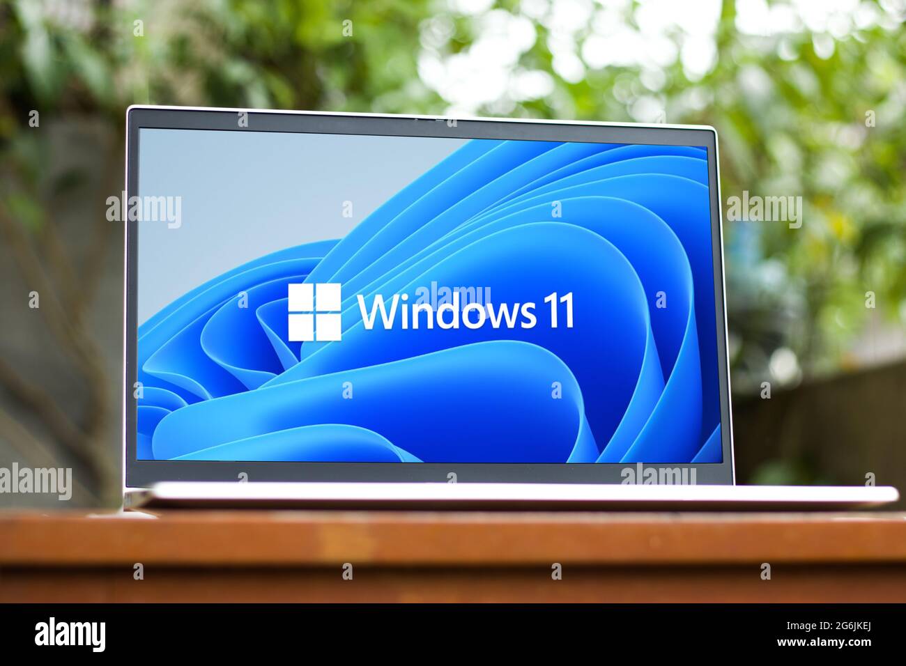 Windows 11 logo on laptop screen stock image Stock Photo - Alamy