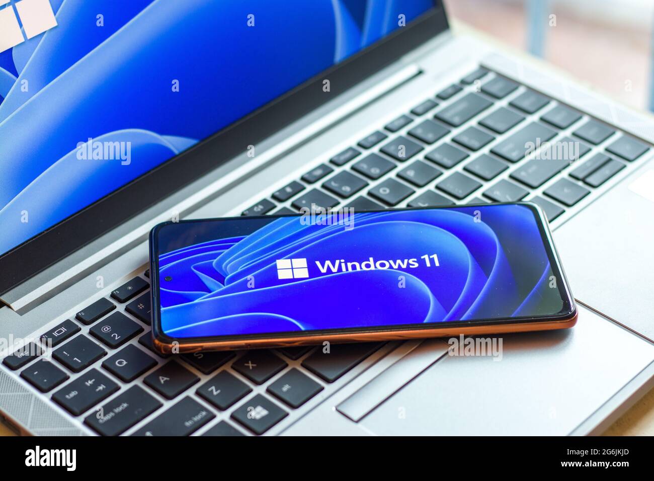 Windows 11 logo on laptop screen stock image Stock Photo - Alamy