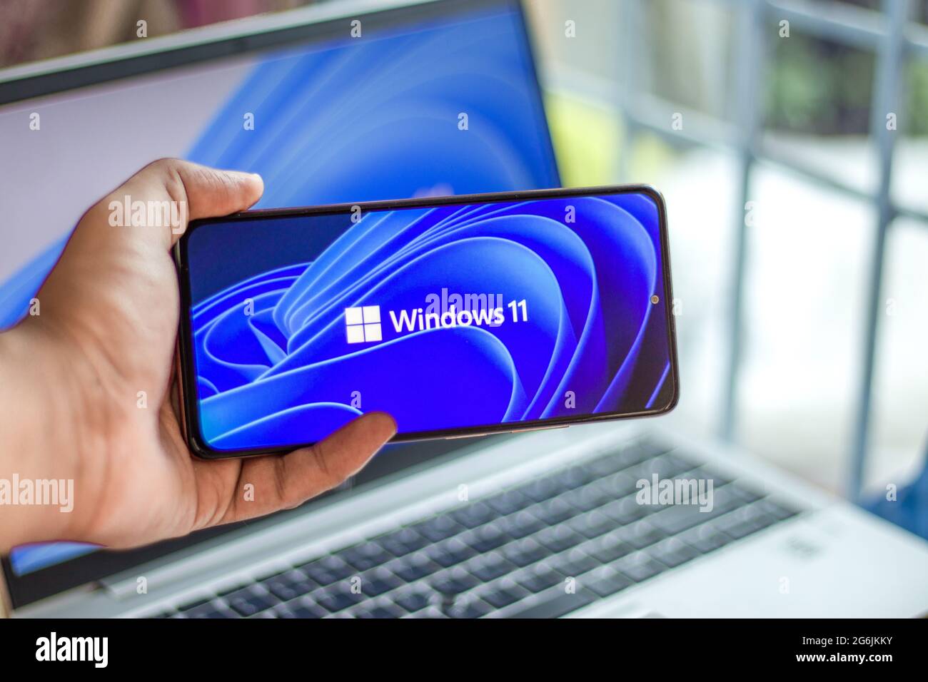 Windows 11 logo on laptop screen stock image Stock Photo - Alamy
