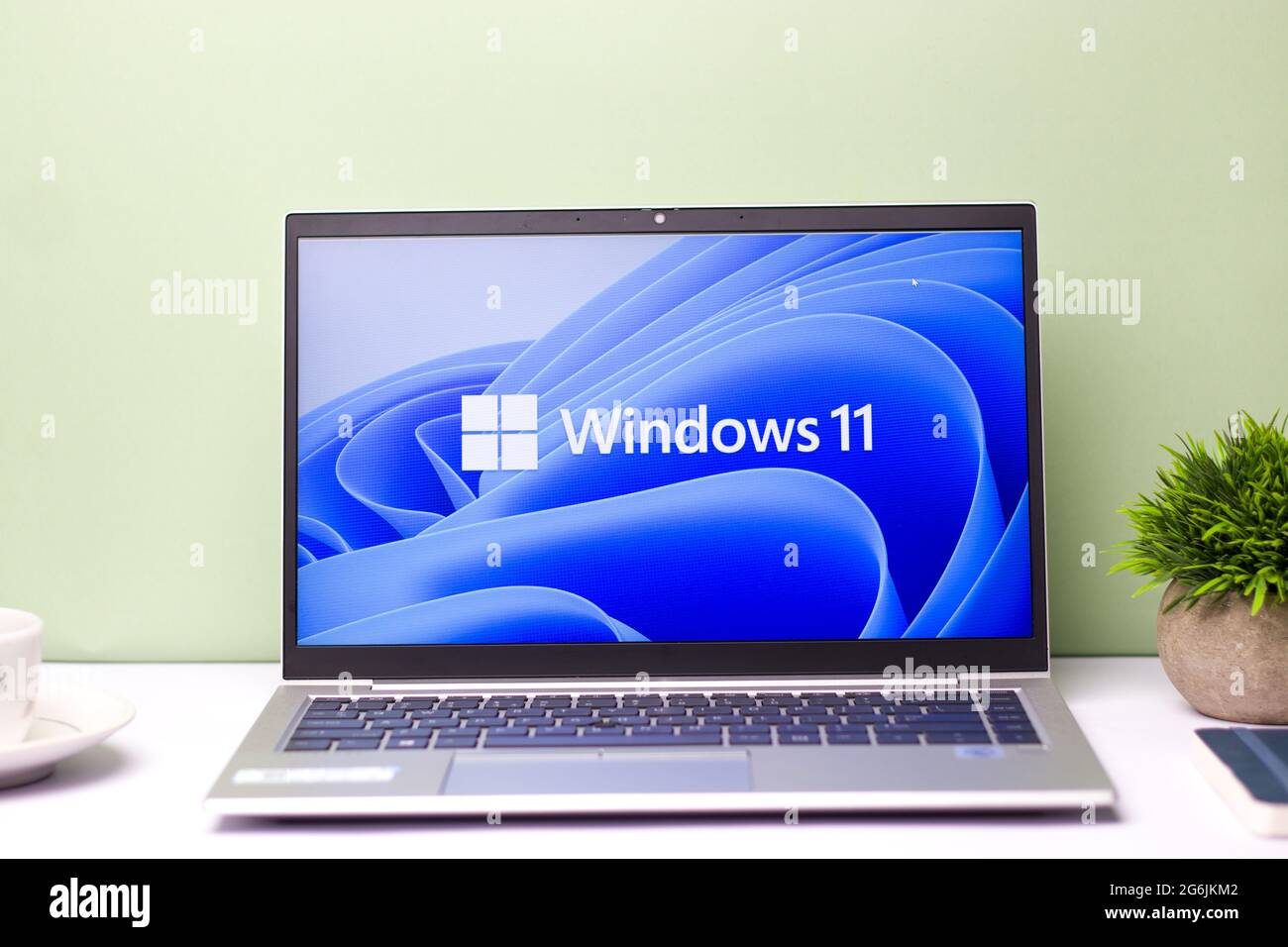 Windows 11 logo on laptop screen stock image Stock Photo - Alamy