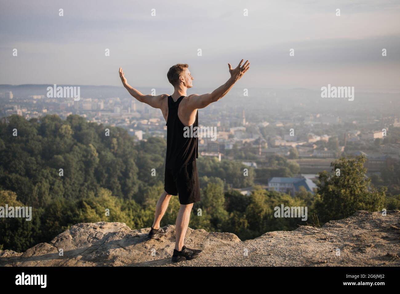 Muscular man outstretched arms hi-res stock photography and images - Alamy