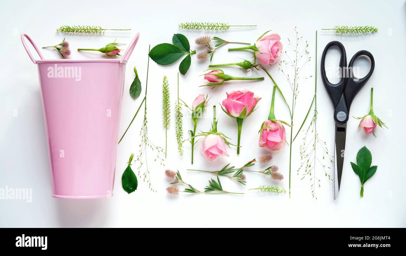 Floristic composition flat lay.Work of the florist,drawing up a flower ...