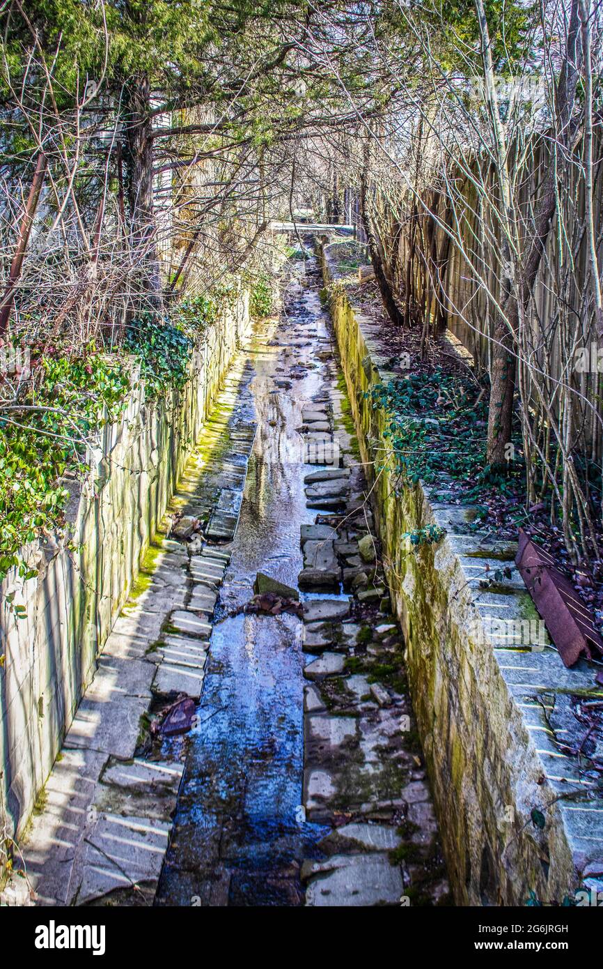 Masonry walled stream channel running through midwest city of ...