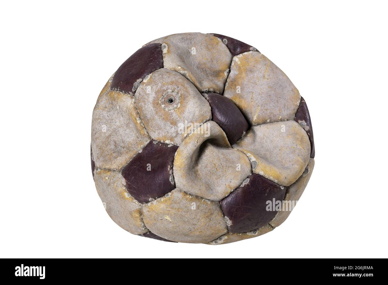 Old soccer ball to play on the leg on a white table. Leather and ...