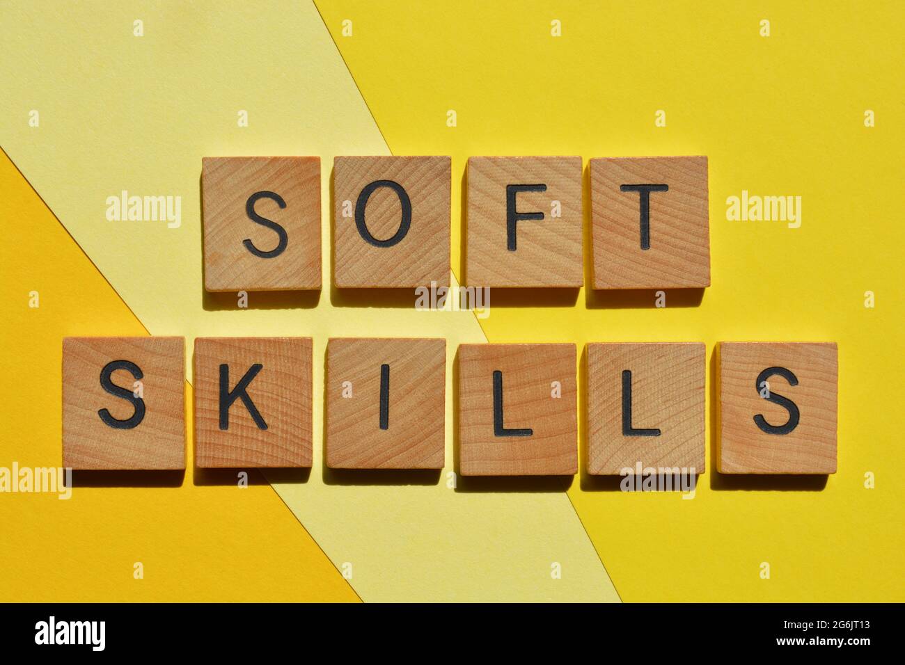 Soft Skills, words in wooden alphabet letters isolated on yellow ...