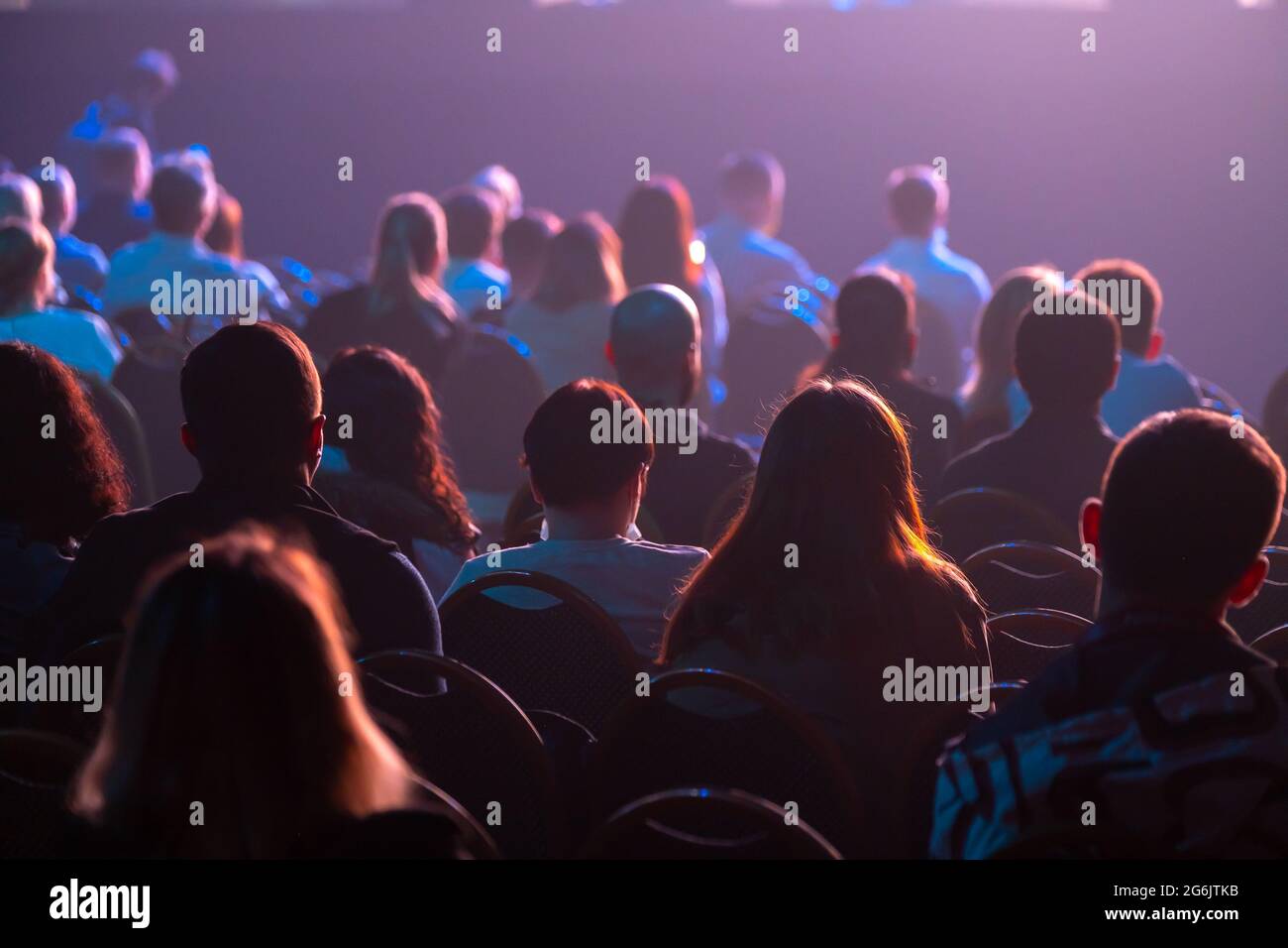 Business conference attendees sit and listen Stock Photo - Alamy