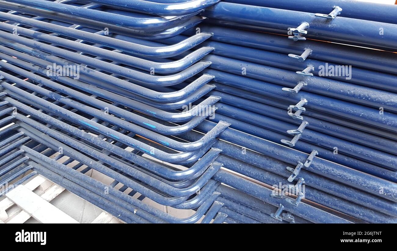 close-up photo of scaffolding Steel pipe stacking for scaffolding ...