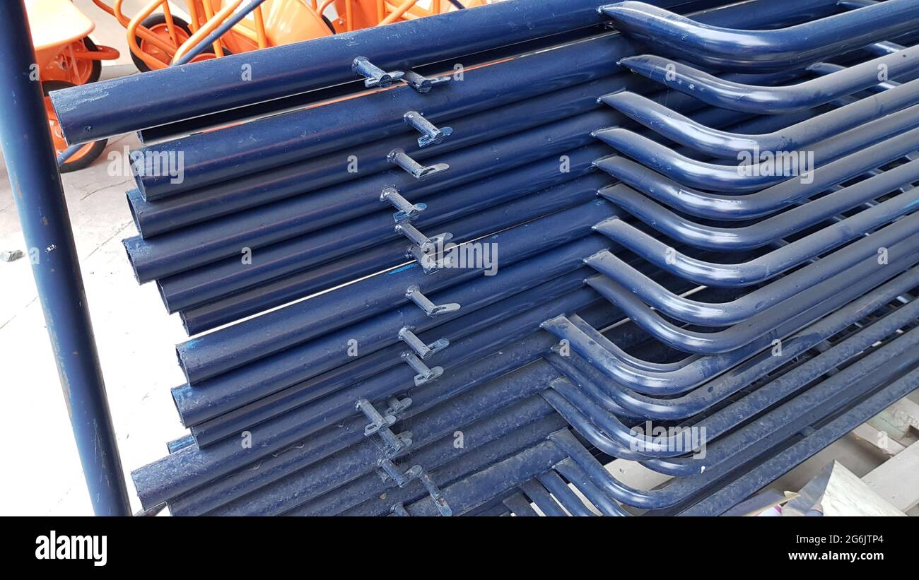 close-up photo of scaffolding Steel pipe stacking for scaffolding ...