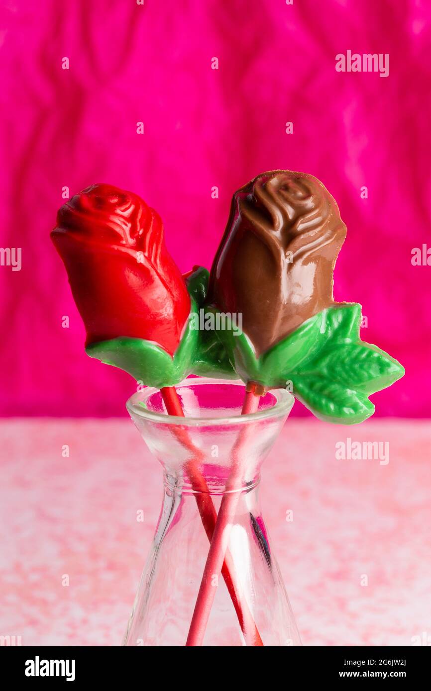 Molded Chocolate Roses on a Stick for Valentines Day Stock Photo - Alamy