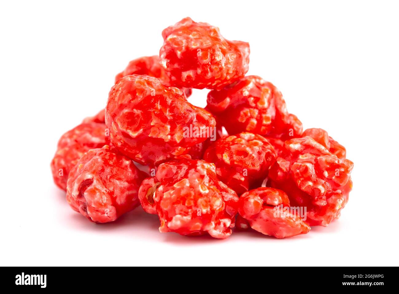 Red Cinnamon Popcorn on a White Background Stock Photo - Alamy
