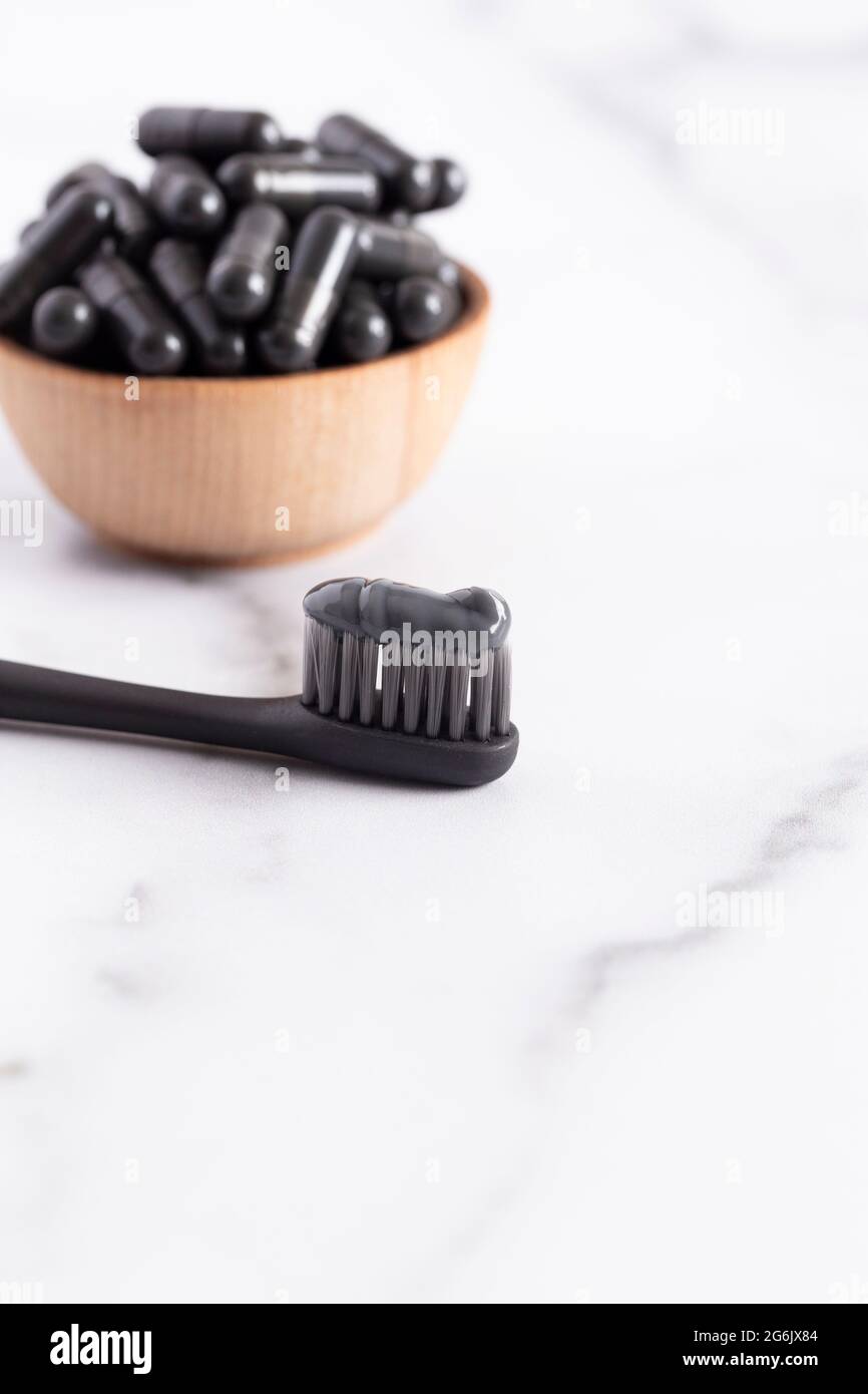 A Black Toothpaste with Capsule of Activated Charcoal Stock Photo - Alamy