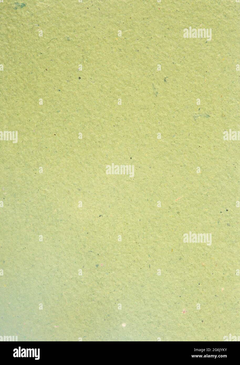 A Background of Green Textured Handmade Paper Stock Photo - Alamy