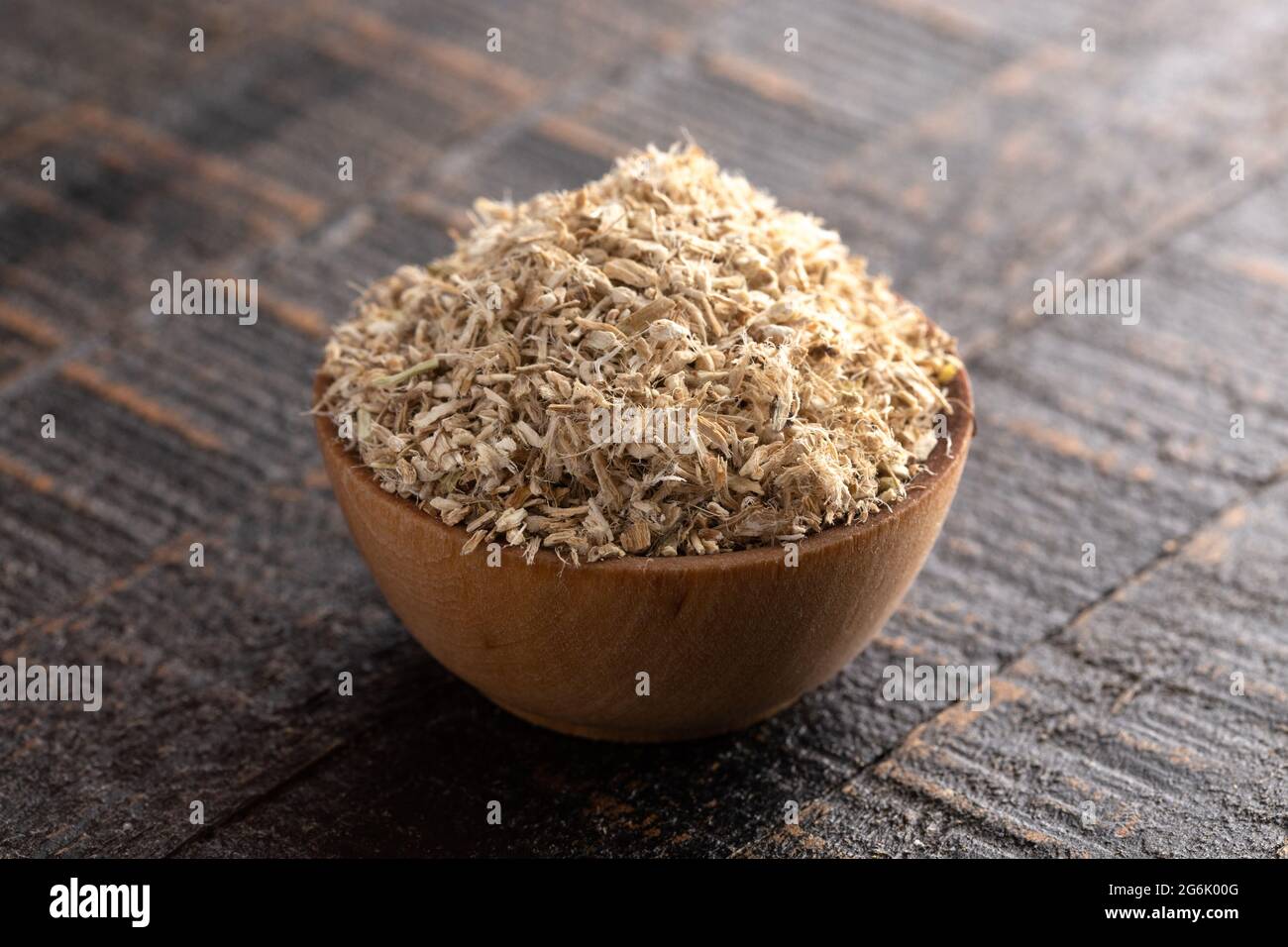 Dried Marshmallow Root Herb in a Wooden Bowl Stock Photo - Alamy