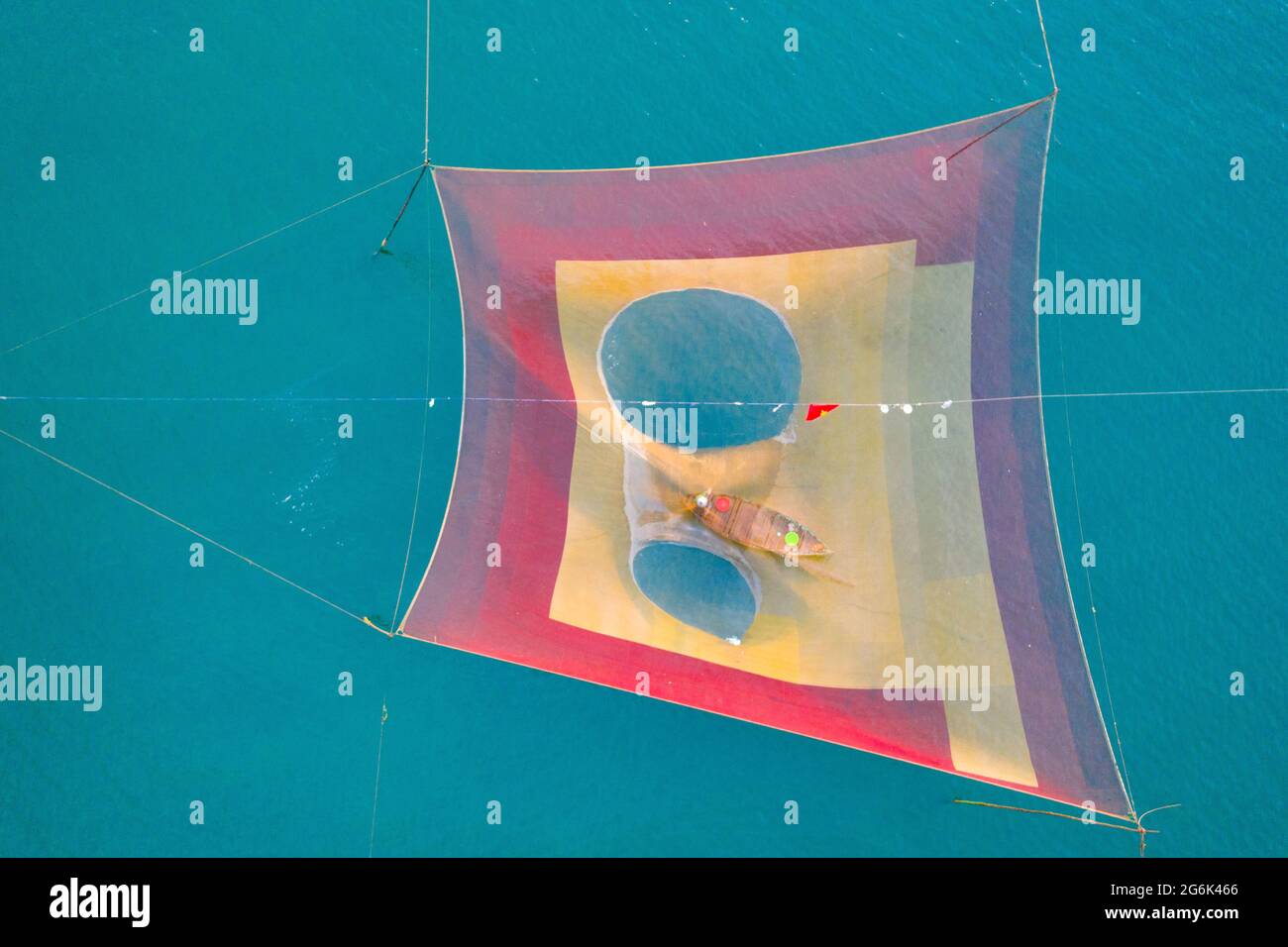 Yellow fishing net on the river central Vietnam Stock Photo - Alamy