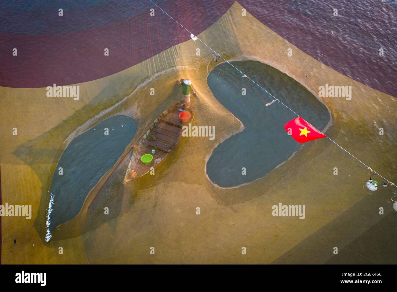 Yellow fishing net on the river central Vietnam Stock Photo - Alamy