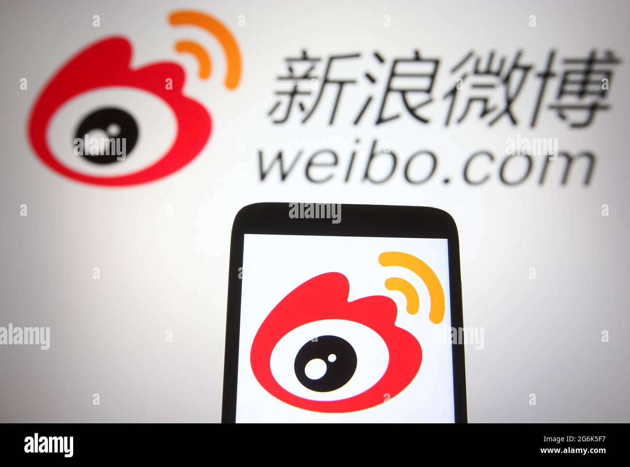 In this photo illustration a Weibo (Sina Weibo) logo of a Chinese social media platform is seen ...
