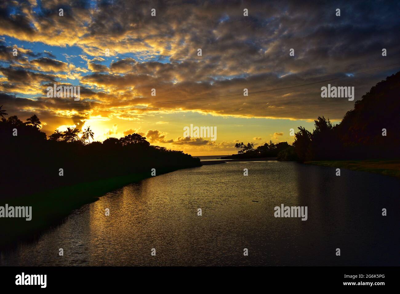 Sunset at Waimea Bay, North Shore, Oahu, HI Stock Photo - Alamy