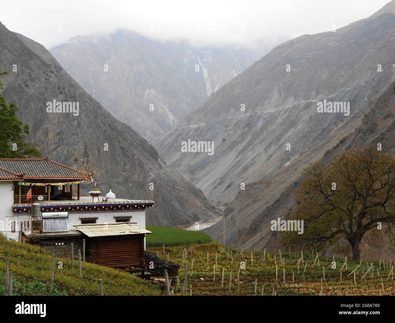 Tibetan Home Overlooking the Lancang River Stock Photo - Alamy