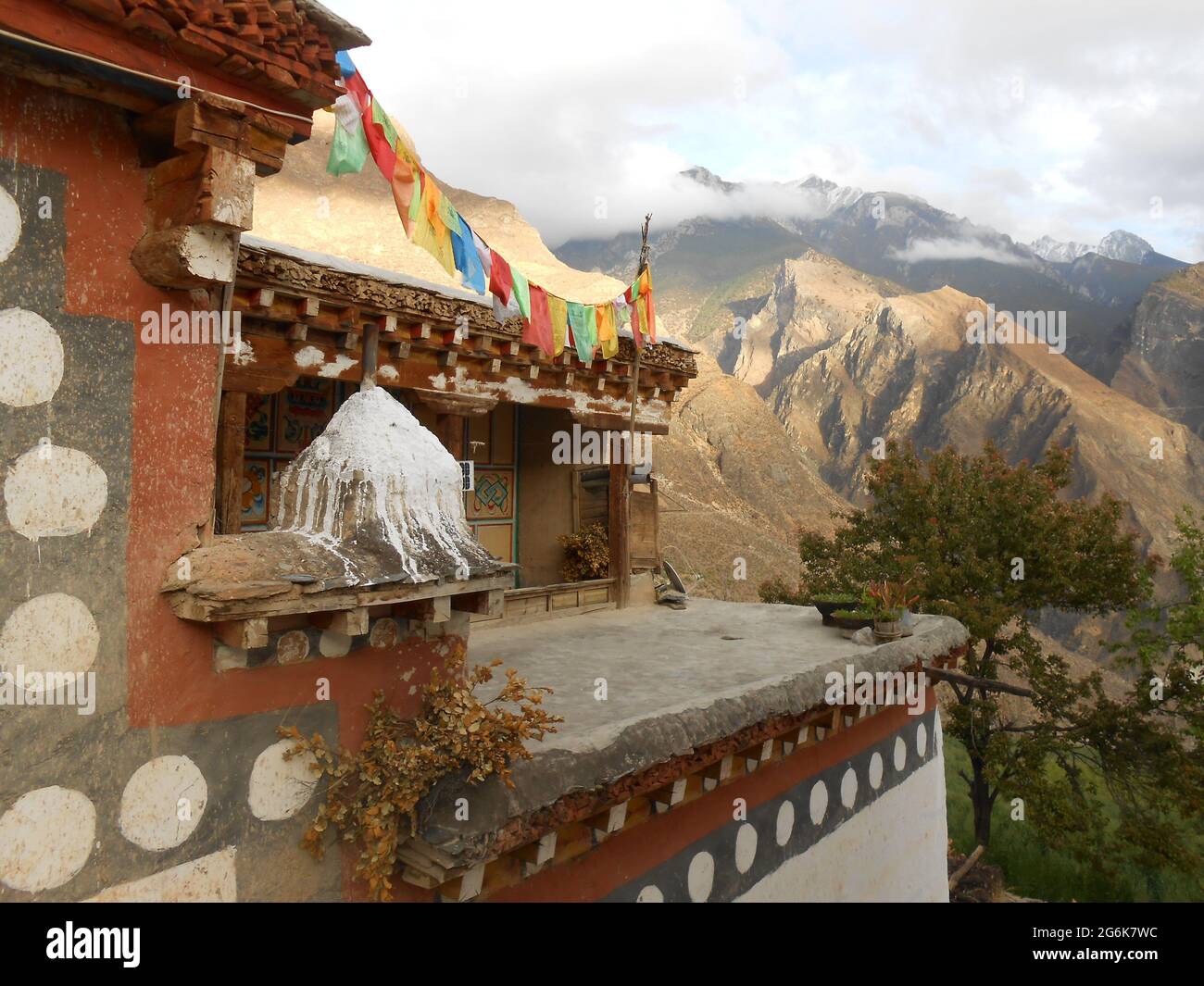 Rural Tibetan Home with Prayer Flags Stock Photo - Alamy