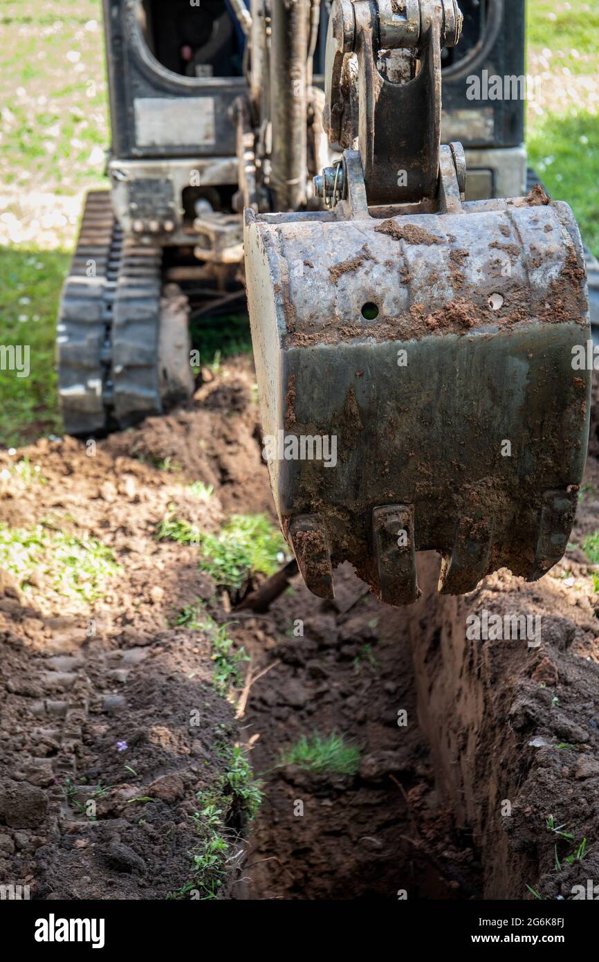 Mini excavator digging ground hi-res stock photography and images - Alamy