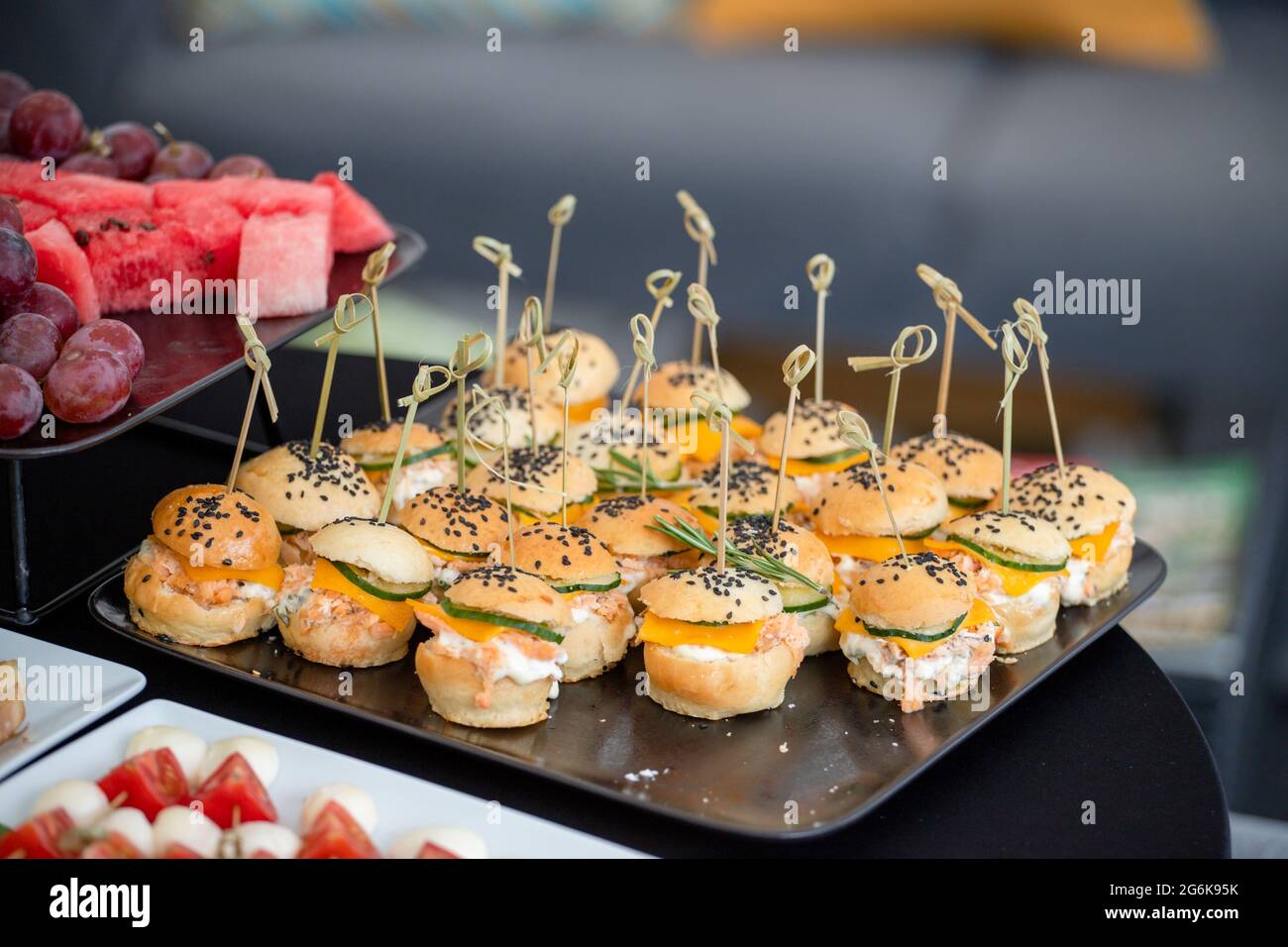 Mini burgers with black sesame seeds at the buffet table Stock Photo ...
