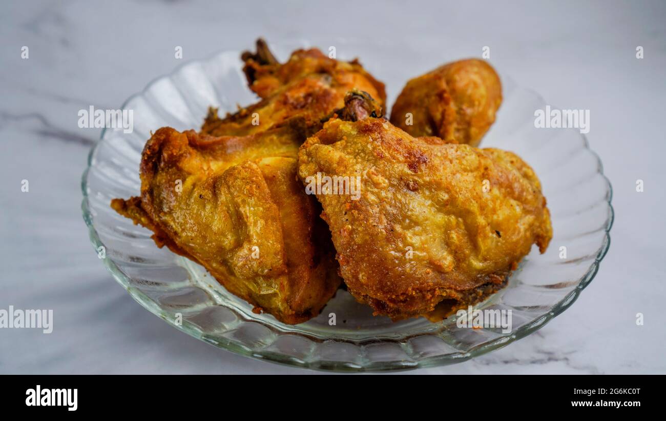 Ayam goreng kunyit or Turmeric fried chicken, deep fried chicken ...
