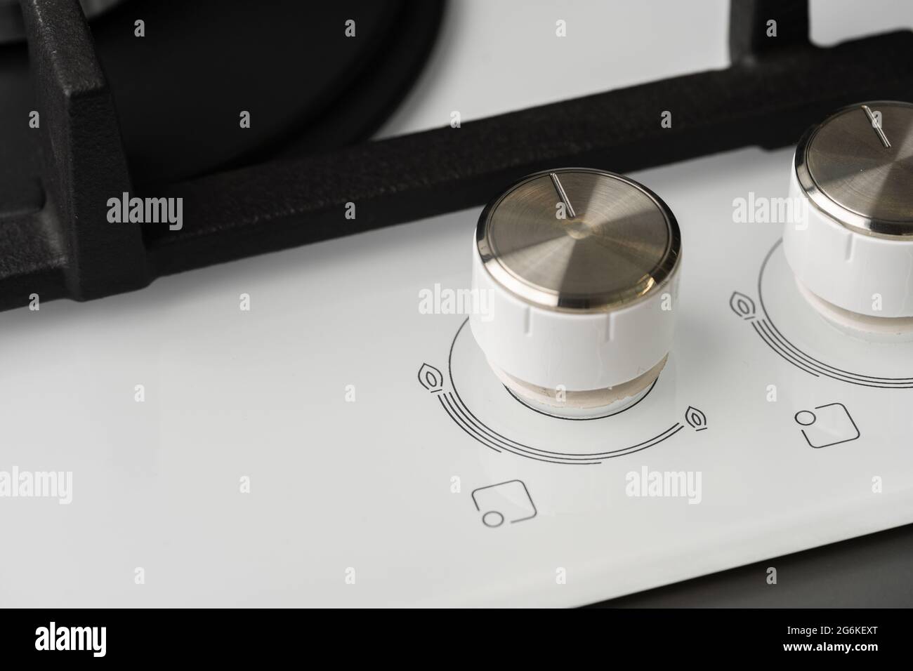 Knob switch on the electric stove close-up Stock Photo - Alamy
