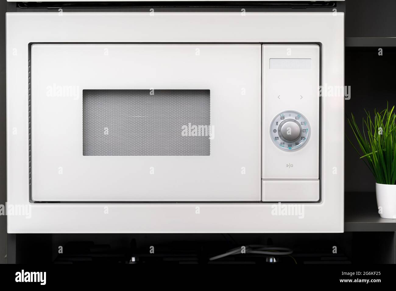 New modern microwave oven in a shop, close up Stock Photo - Alamy