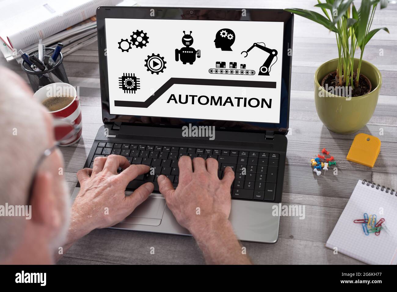 Automation concept shown on a laptop used by a man Stock Photo - Alamy