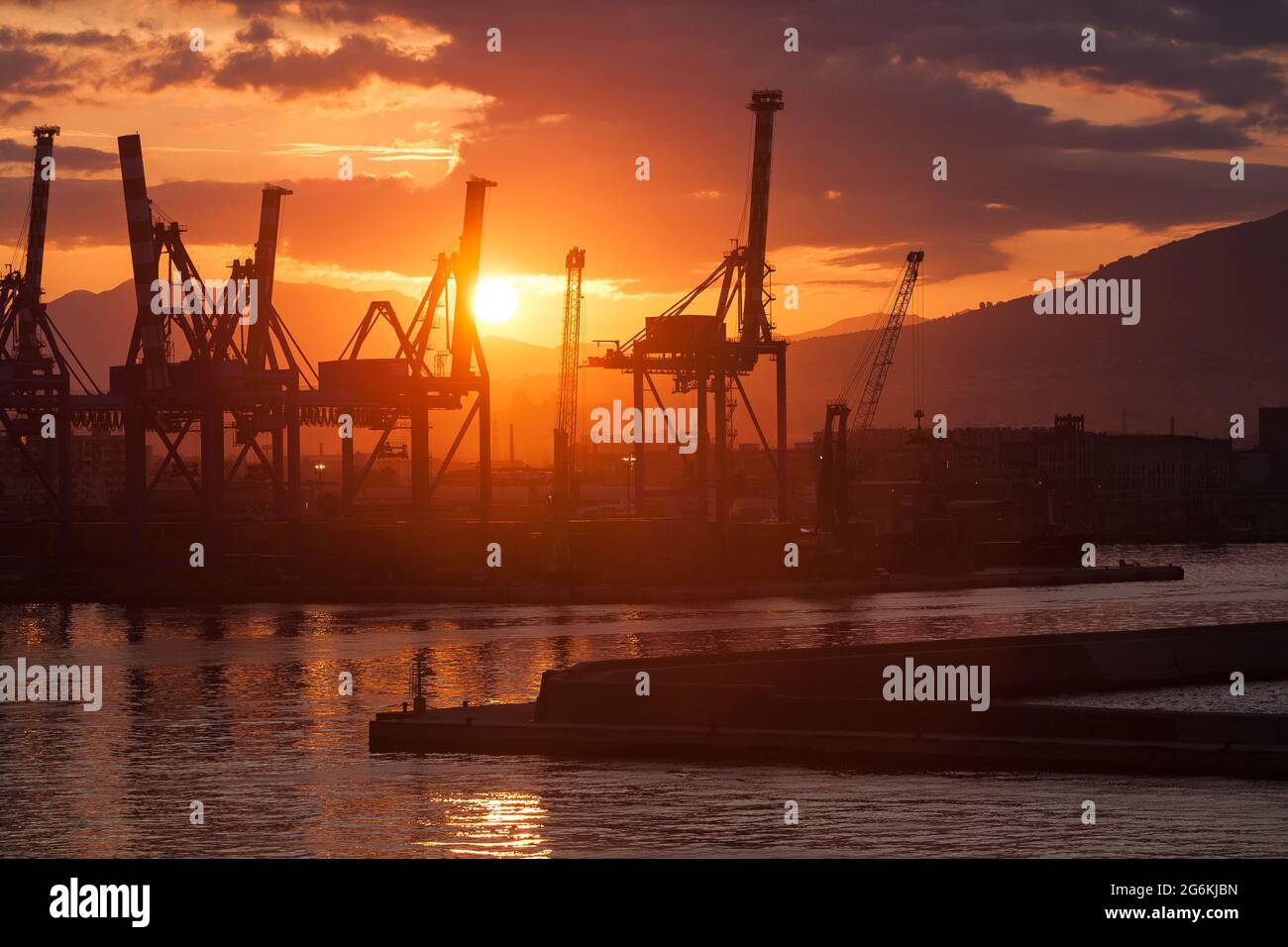 Morning arrival Naples Italy. container ship gantries waiting for ship ...