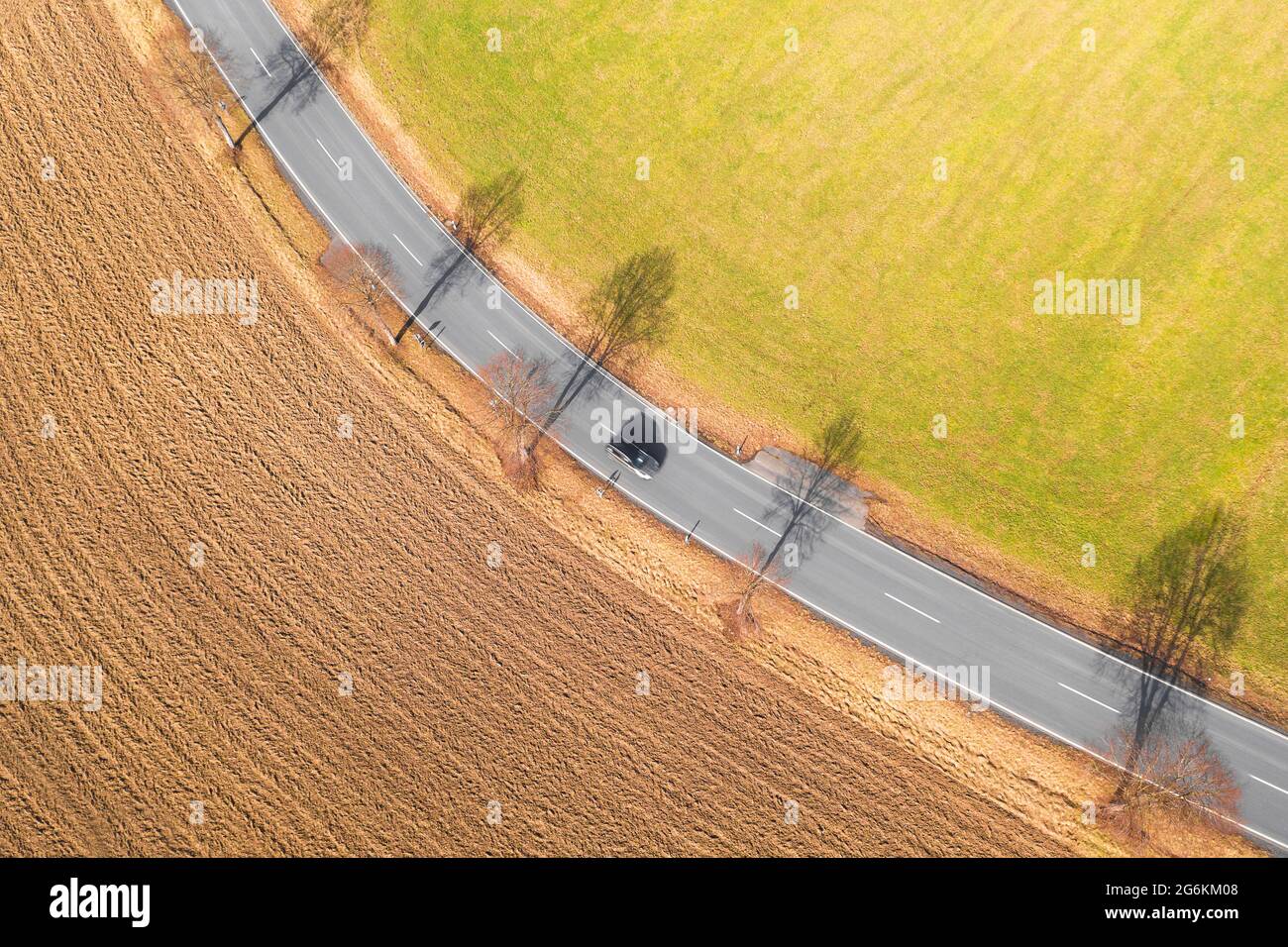 Lone car on street hi-res stock photography and images - Alamy