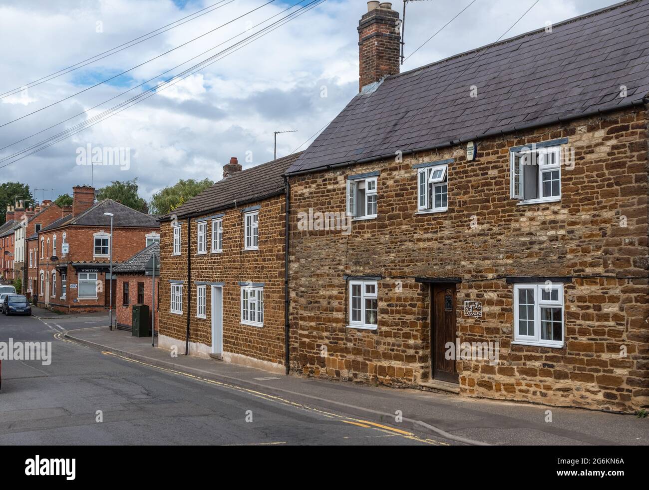 Street scene in the village of Wootton, Northampton, UK; to the right ...