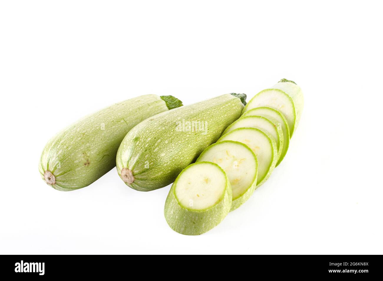 Courgettes on a white background. Courgettes are fresh and delicious ...