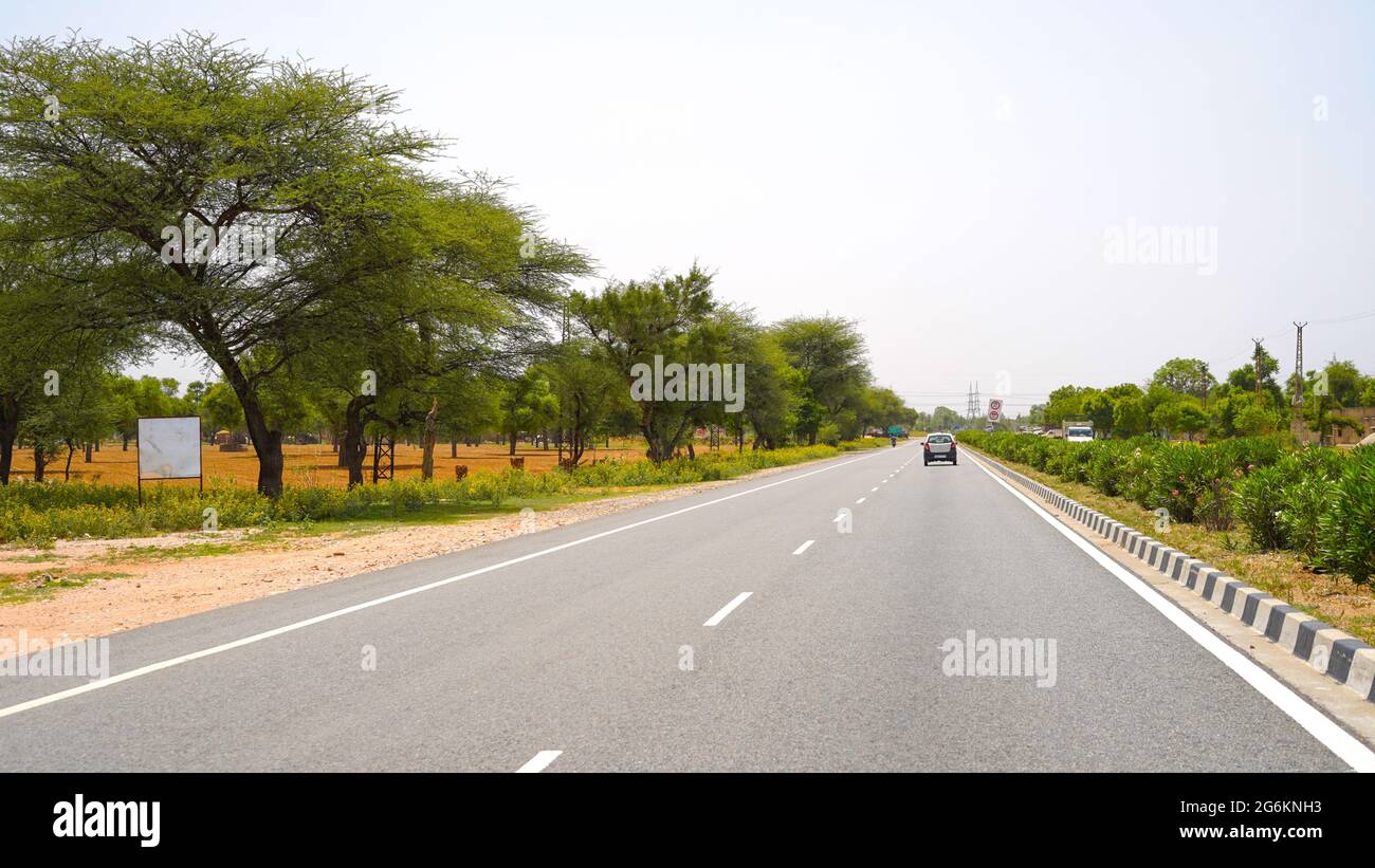 Real High way asphalt road passing through forest with attractive ...