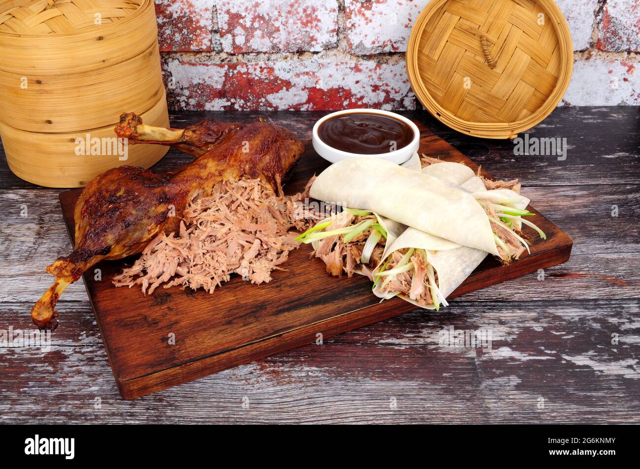 Aromatic half crispy duck with Chinese style pancakes, spring onions ...