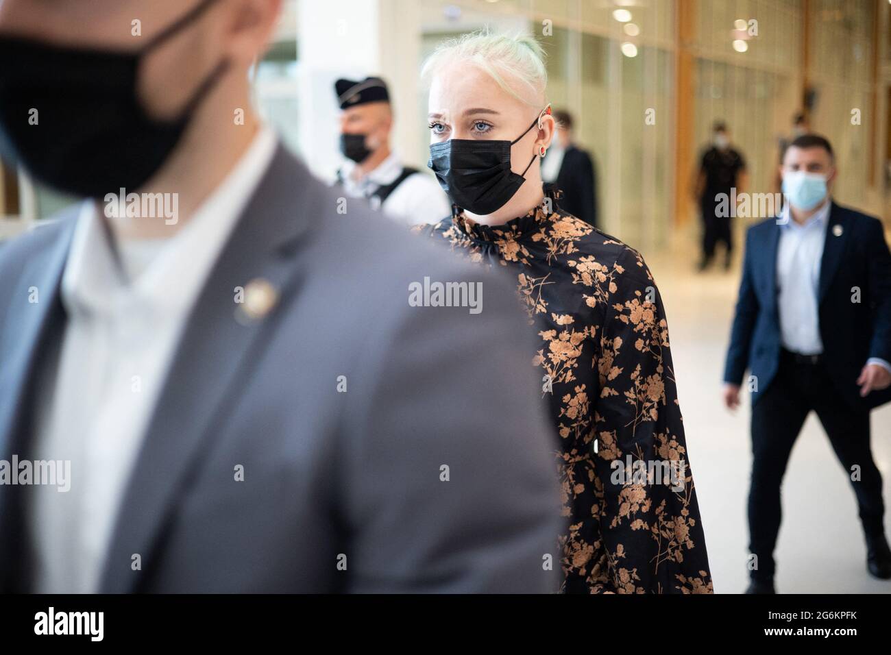 The teenager identifying herself online as Mila leaves the courtroom ...