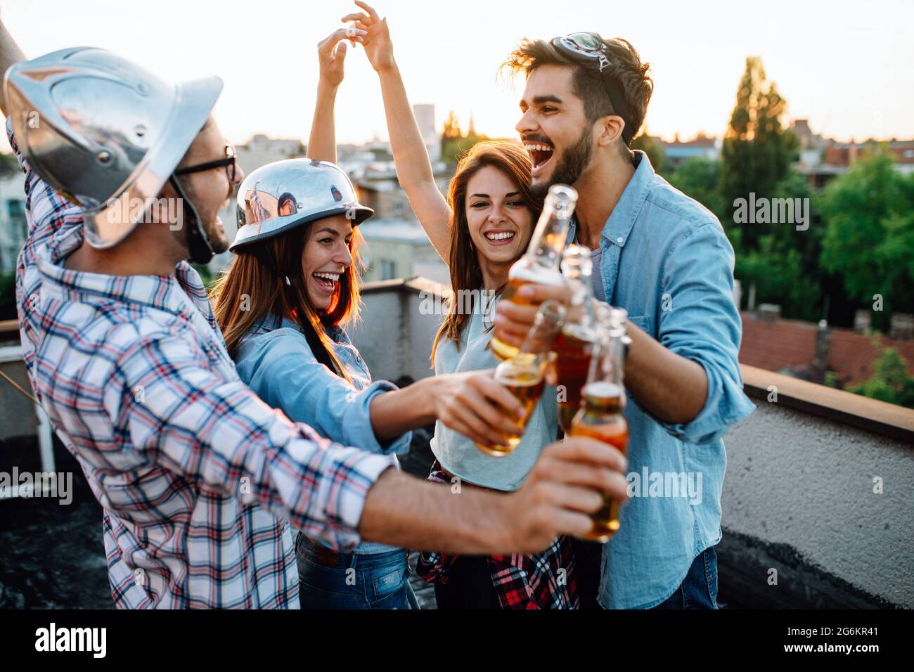 Cheerful friends having party together hi-res stock photography and ...