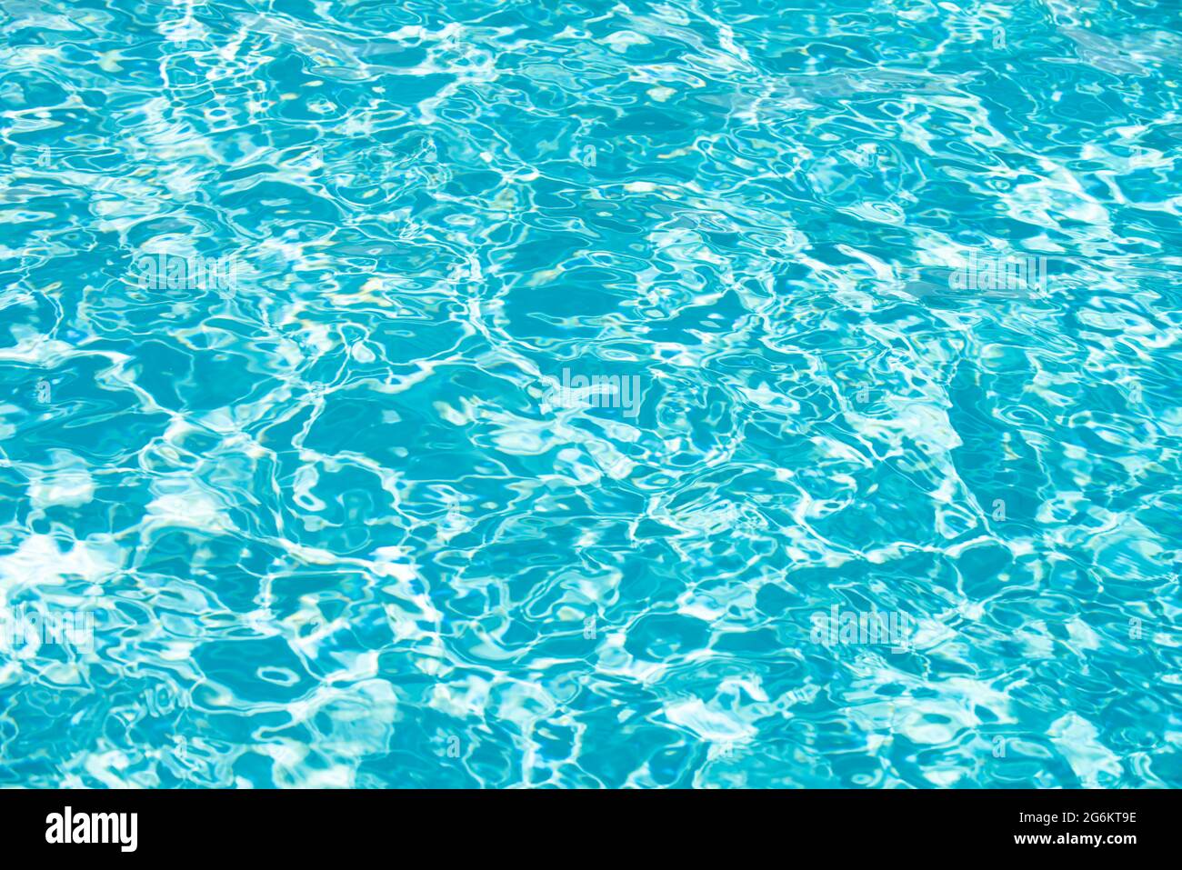 Abstract ripple wave and clear turquoise water surface in swimming pool ...