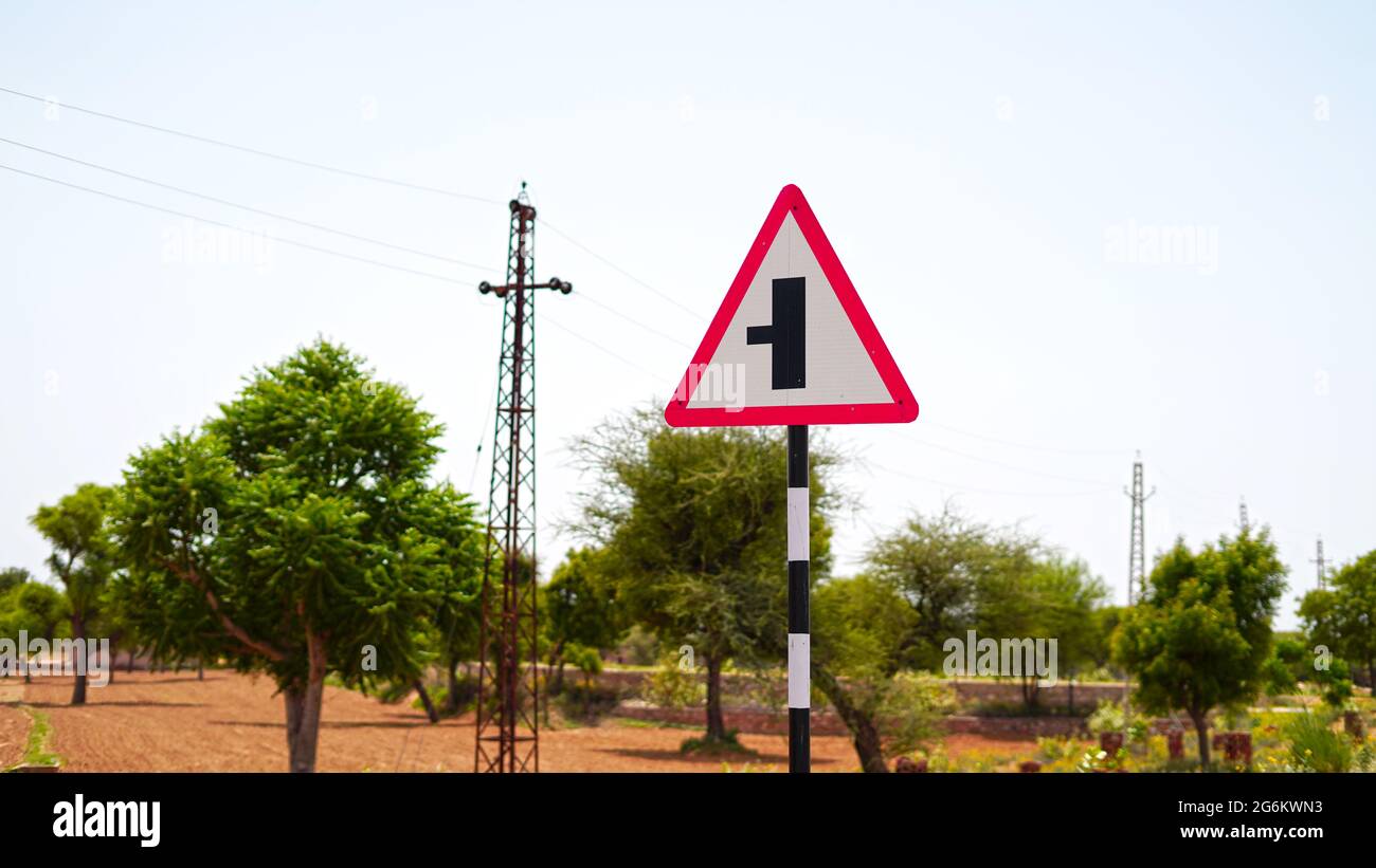 Sign board to move turn left on road. Road sign with attractive Black ...