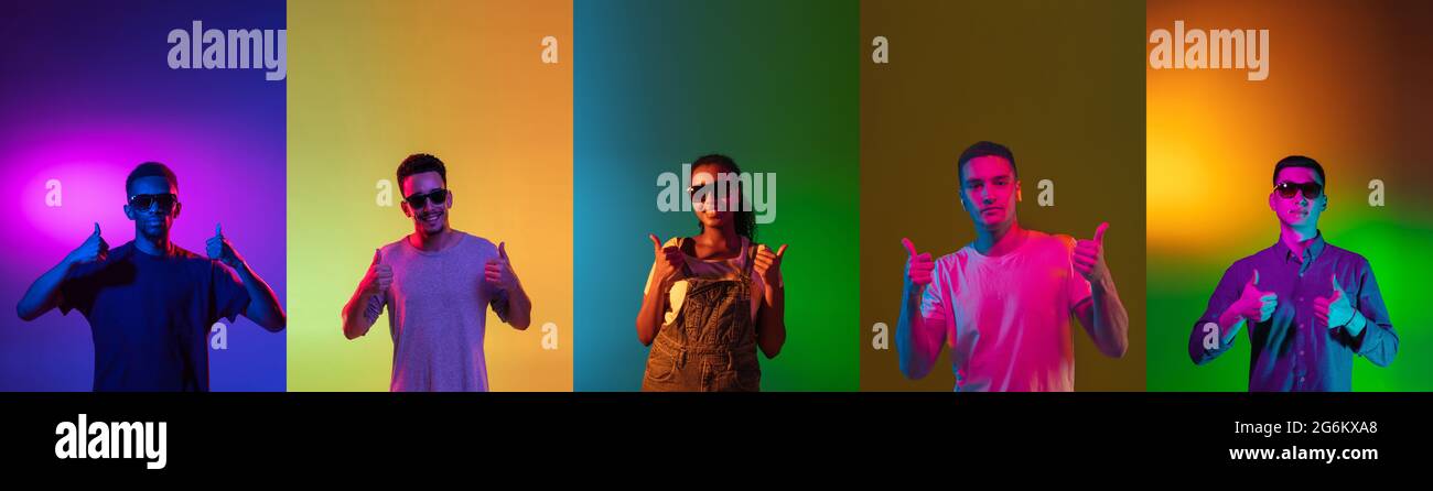 Portrait of group of people on multicolored background in neon light ...