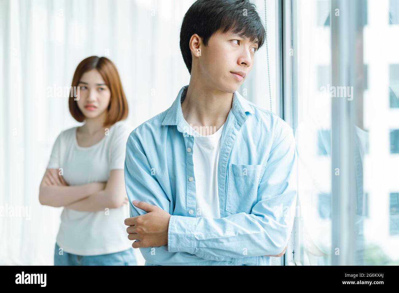 Portrait of an Asian couple in conflict Stock Photo - Alamy