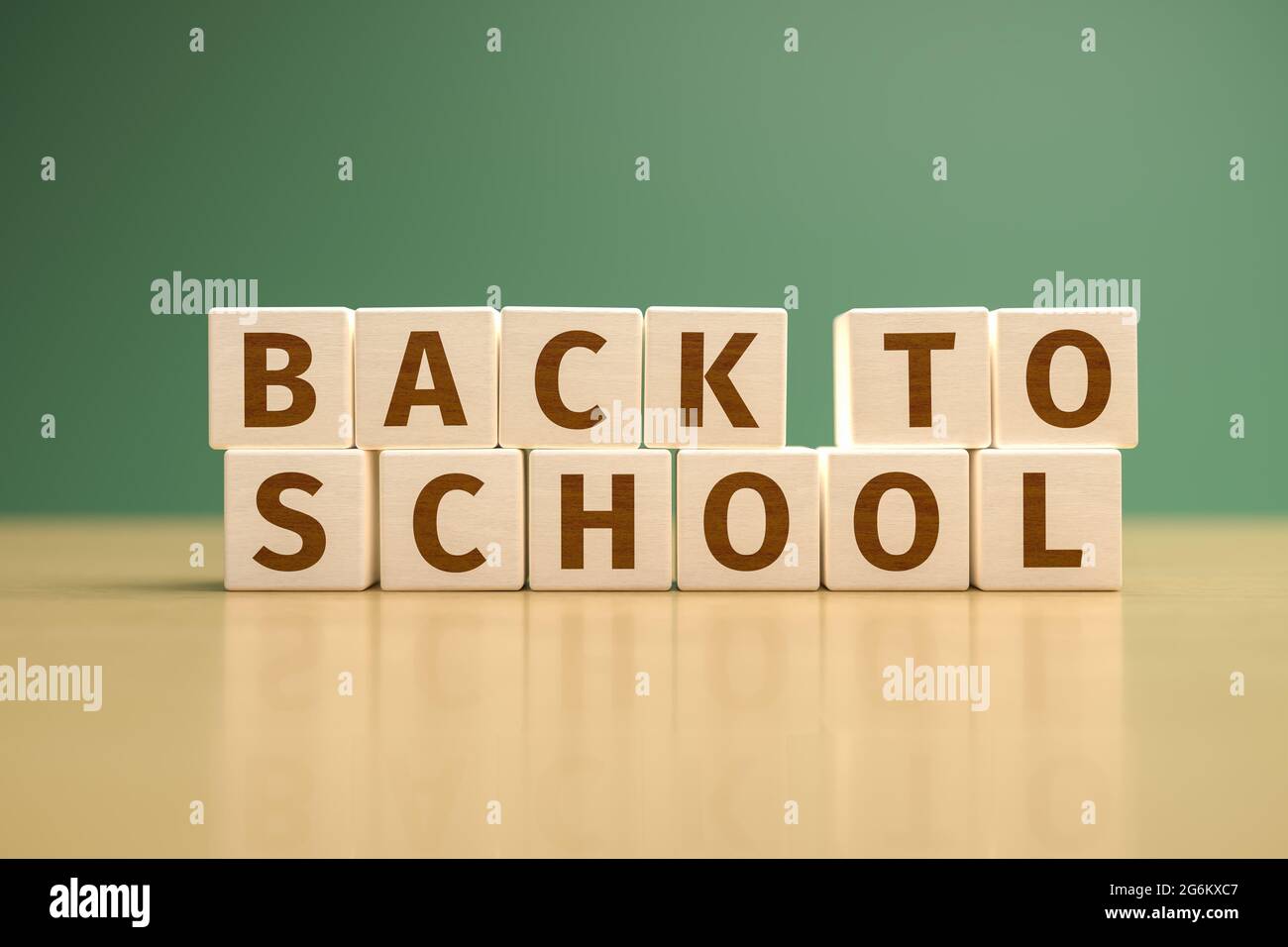 Stacked wooden toy blocks forming the words "back to school". Schools ...