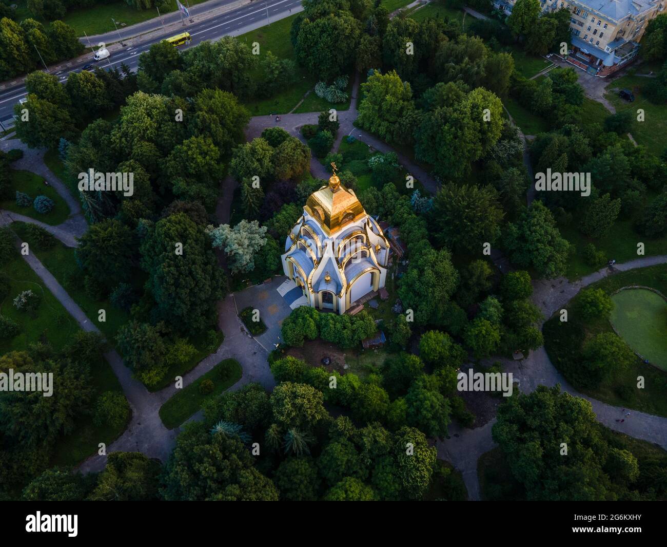 christian church with golden dome in green summer park aerial view ...