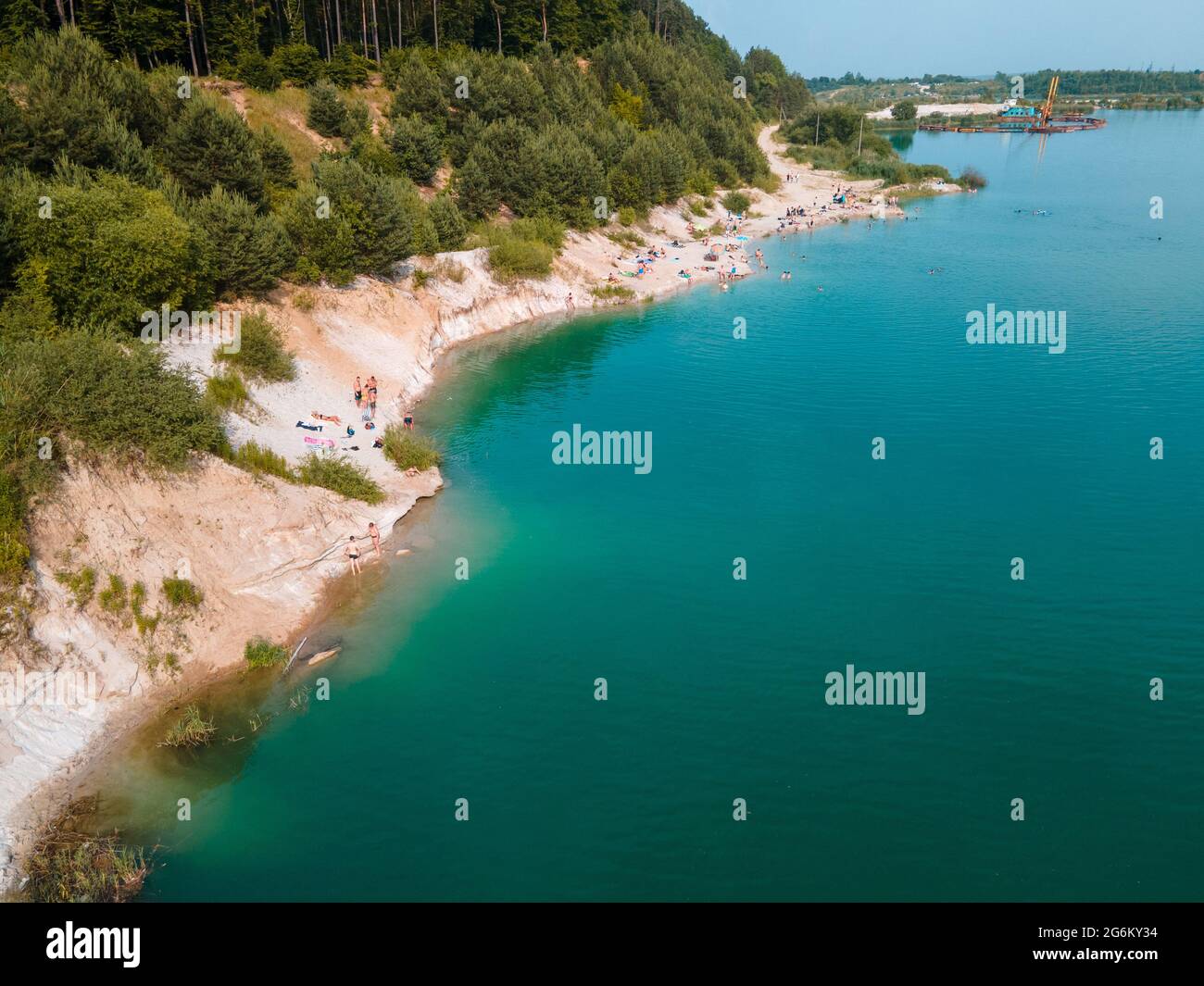 aerial view of people swimming in blue azure water sunbathing resting ...