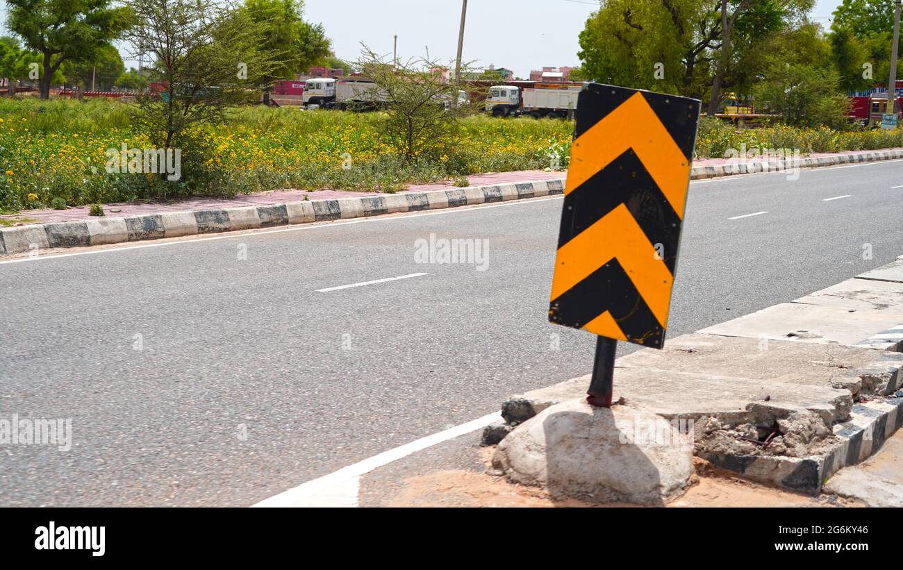 07 July 2021- Reengus, Sikar, India. Real Yellow and Black road sign to ...