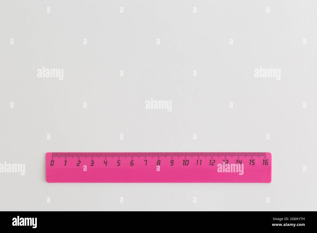 School pink ruler on grey background. Top view with copy space. Flat ...