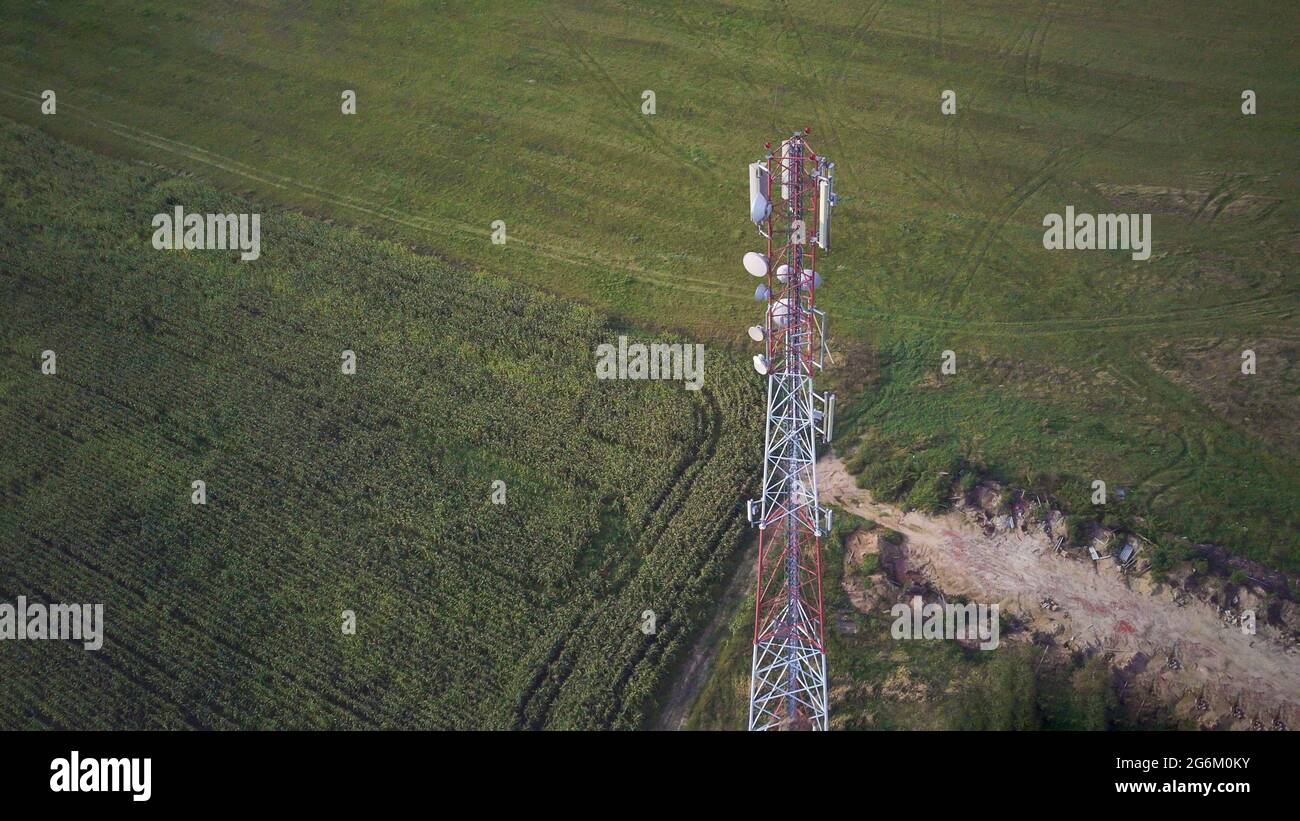 Drone view of a telecommunications tower in a rural area in ...