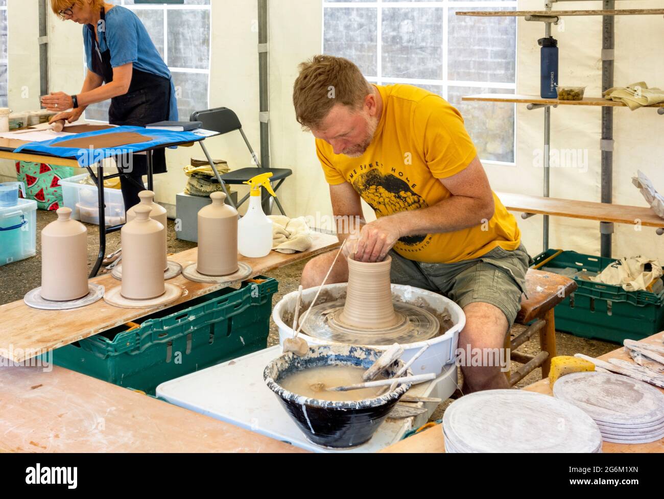 Potter making earthenware pots hi-res stock photography and images - Alamy