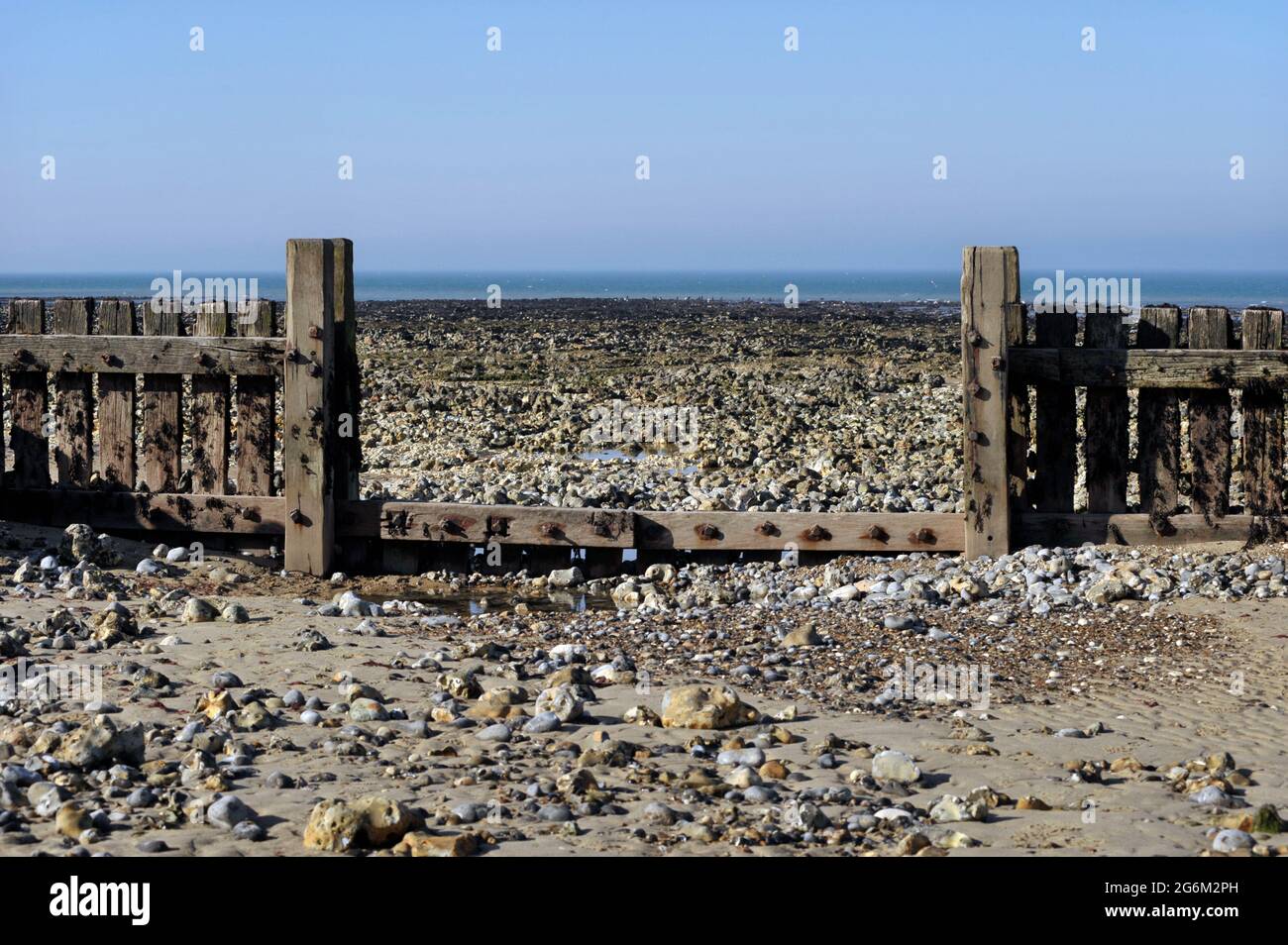 wooden sea defense groynes and rocky forshore at west runton north ...